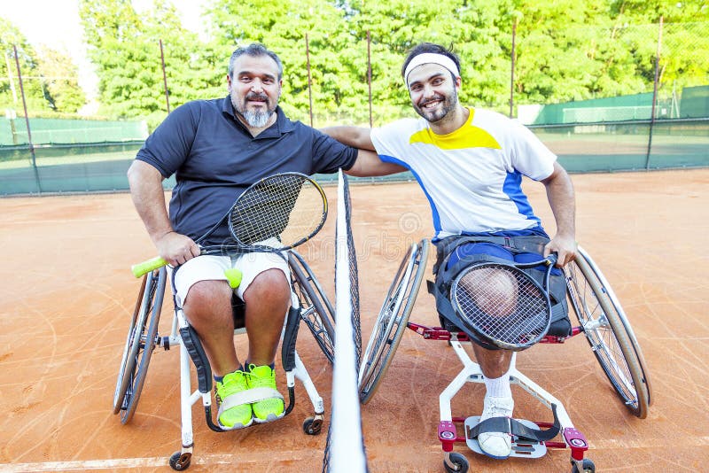Pair of Disabled Tennis Players Hugging Each Other Under the Net Stock ... Pair of Disabled Tennis Players Hugging Each Other Under the Net Stock ...
