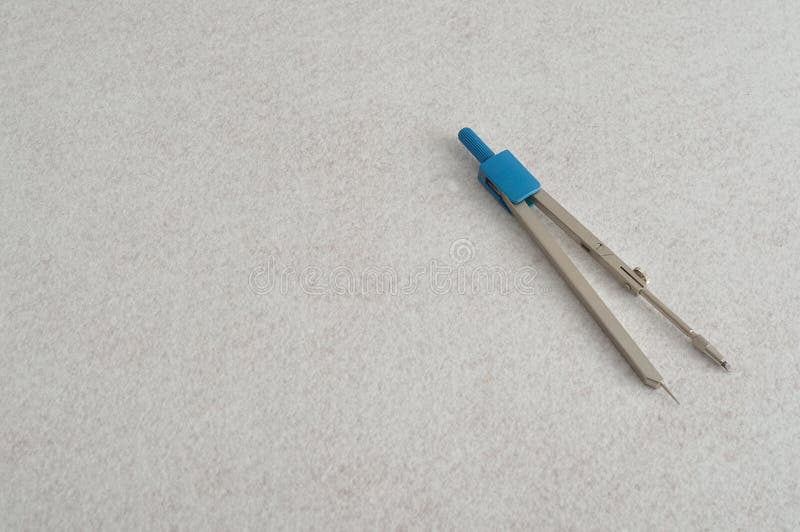 Pair of drawing compasses stock photo. Image of geometry - 83246142