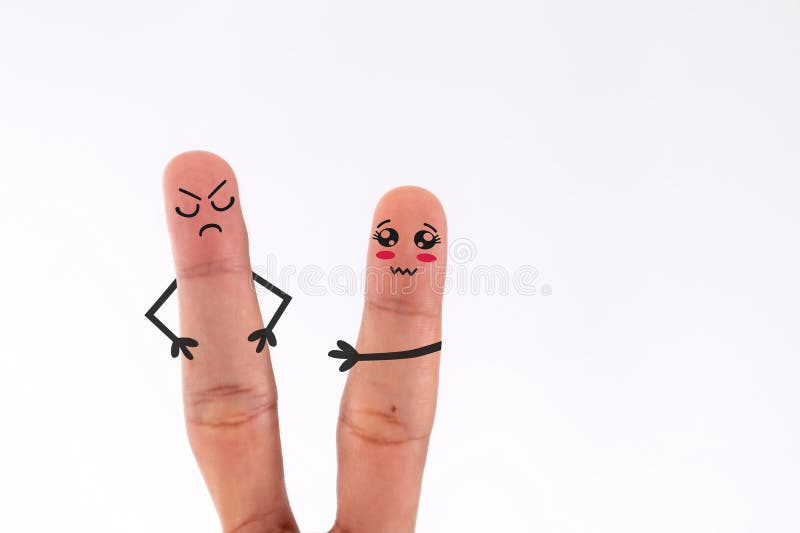 A Pair of Fingers in Conflict, One with a Sad Face and the Other with ...