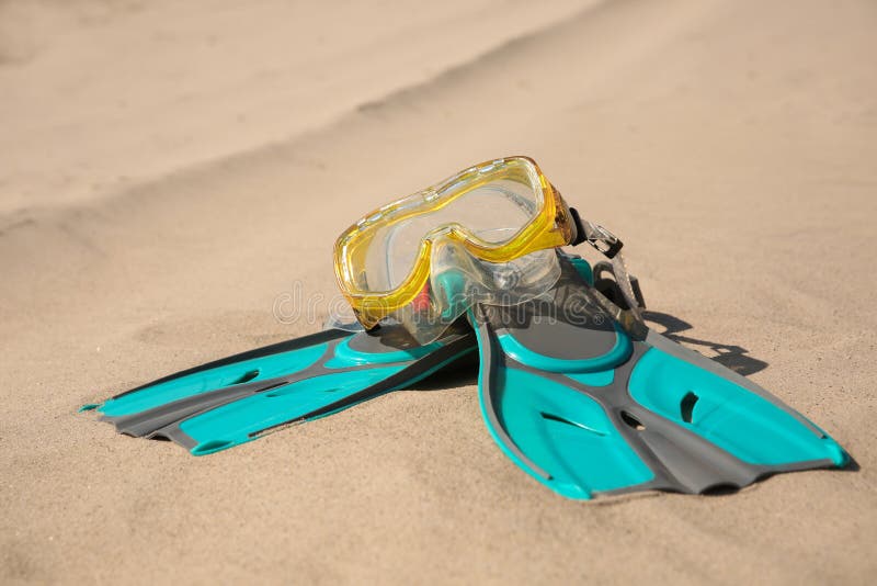 Pair of Flippers and Diving Mask on Sandy Beach Stock Photo - Image of ...