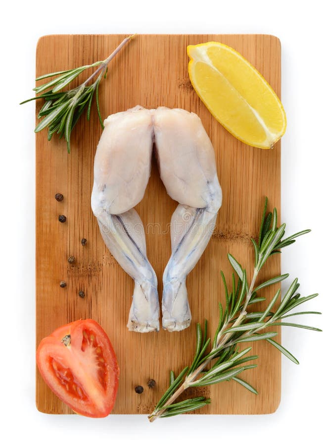 Pair Of Fresh Frog Legs On White Background Stock Photo - Image of ...