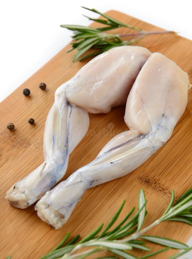 Pair of Fresh Frog Legs on White Background Stock Image - Image of ...