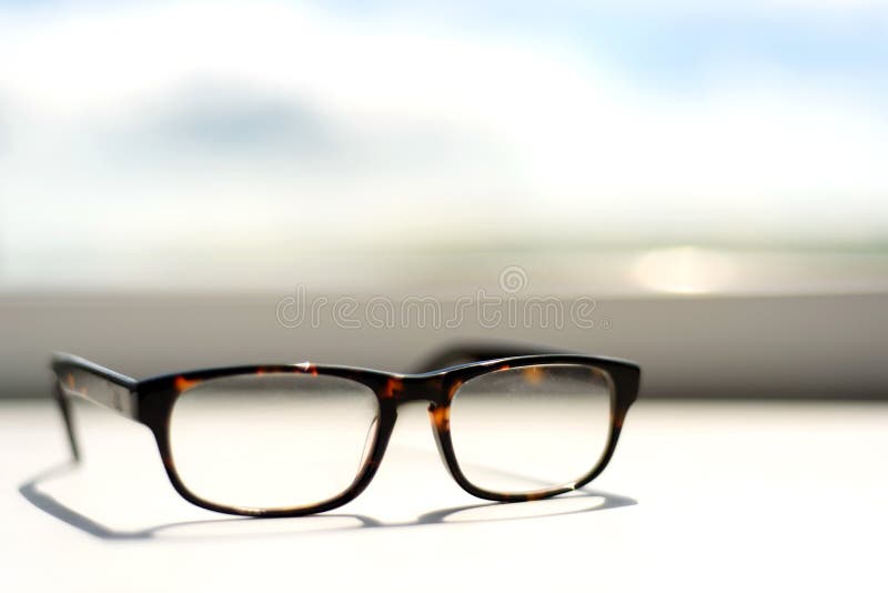 Pair of Glasses on a Windowsill Stock Image - Image of modern, sight ...