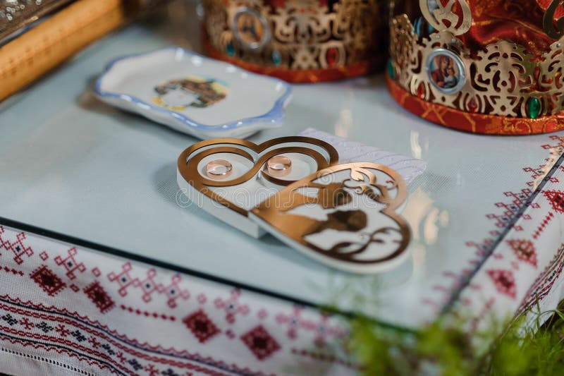 A Pair of Gold Wedding Rings on a Heart-shaped Stand. Wedding Ceremony ...