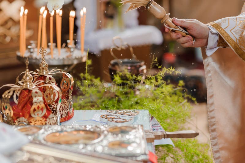 A Pair of Gold Wedding Rings on a Heart-shaped Stand. Wedding Ceremony ...
