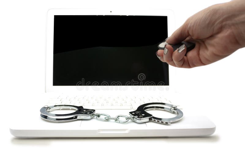 Pair of Handcuffs on the Keyboard Front of a Computer Screen Stock ...