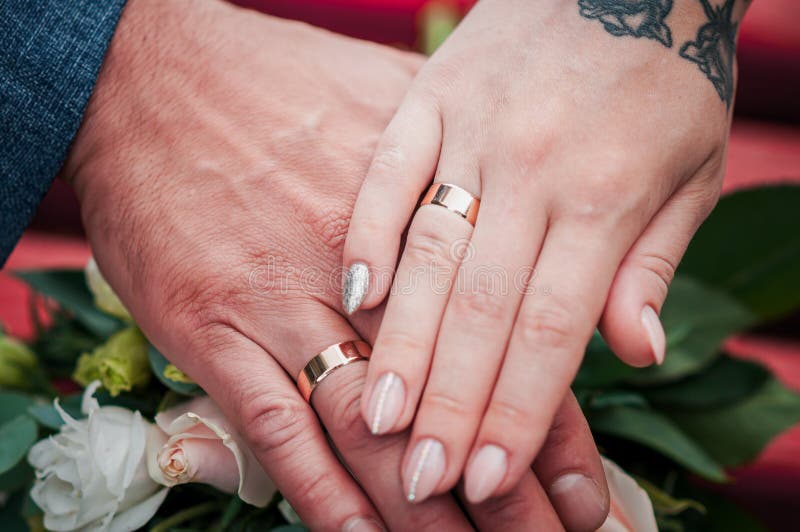 Pair of Hands with Gold Wedding Rings Stock Photo - Image of groom ...