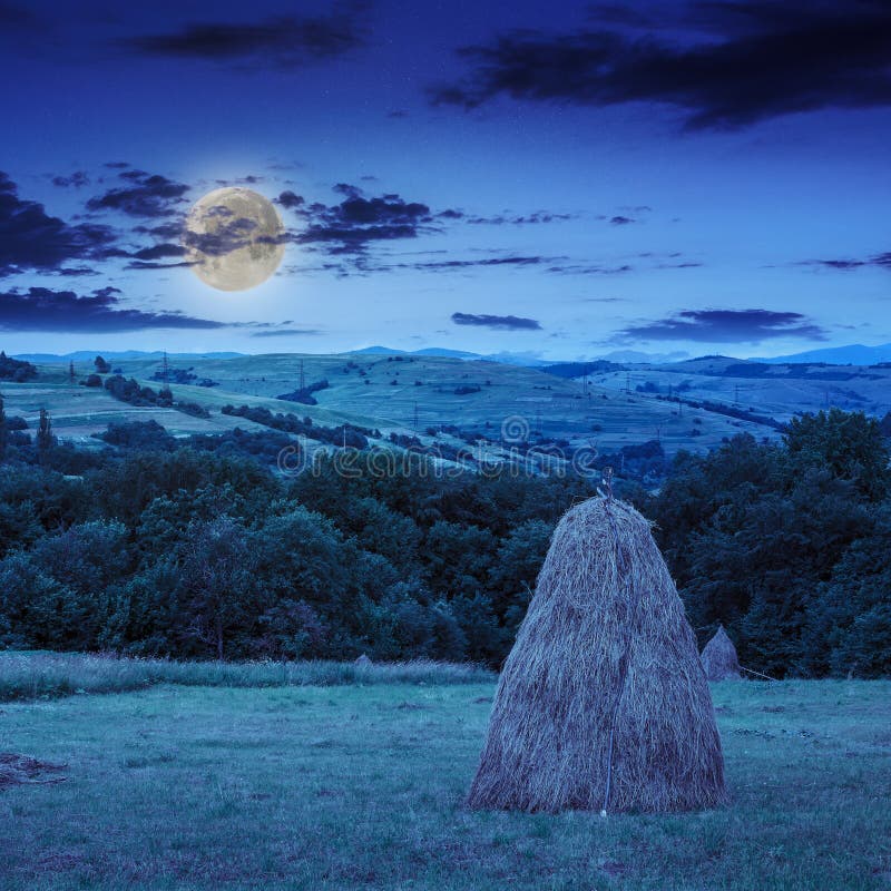 Pair of Haystacks and Tree at Mountain at Night Stock Image - Image of ...