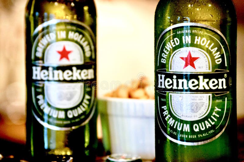 Pair of Heineken beers editorial stock photo. Image of close - 126582373
