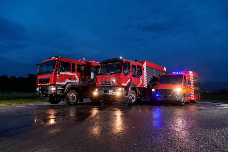A Pair of Highly Modern and Quality Fire Trucks Illuminate the Night ...