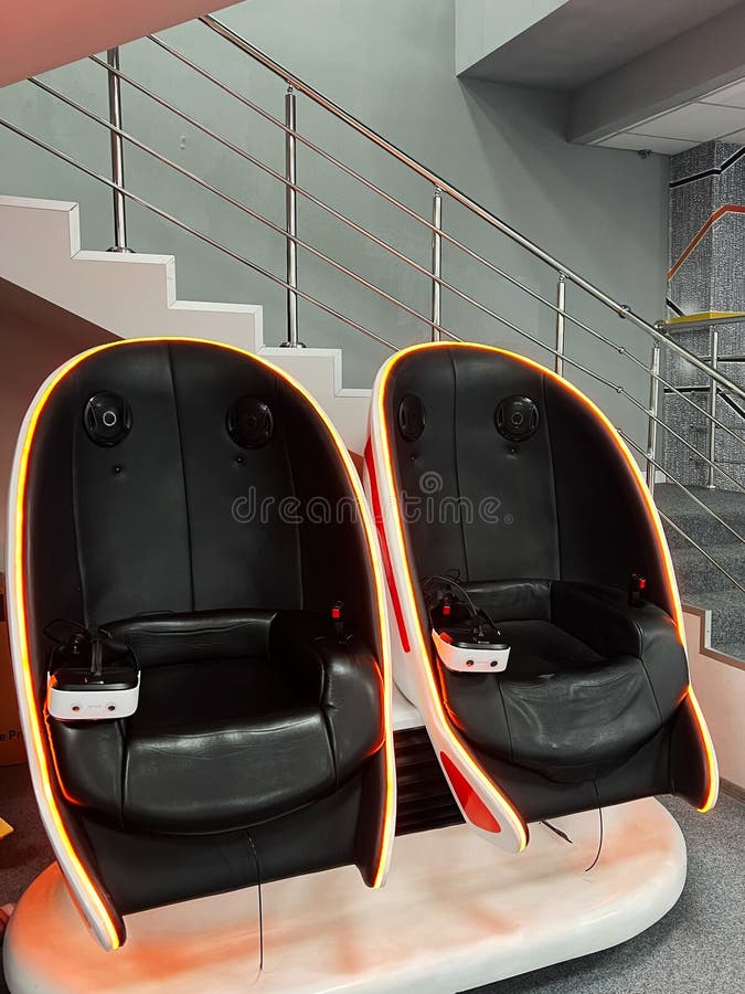 Pair of Interactive VR Chairs with Modern Design and Lighting Under a ...
