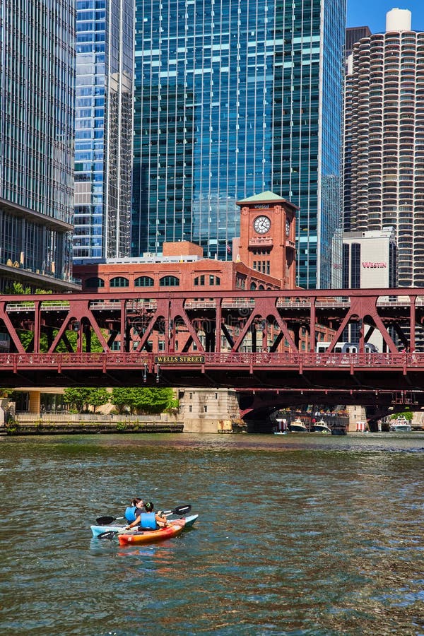 Pair of Kayaks in Chicago Canals Approaching Bridge and Clock Tower ...