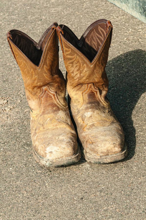 Pair of Leather Cowboy Boots, Covered in Dirt and Chalk Stock Image ...