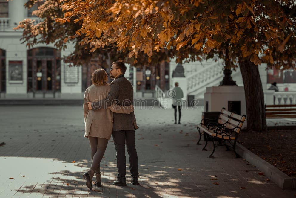 The Pair of Lovers Cuddle and Hold Hands during a Romantic Outing Stock ...