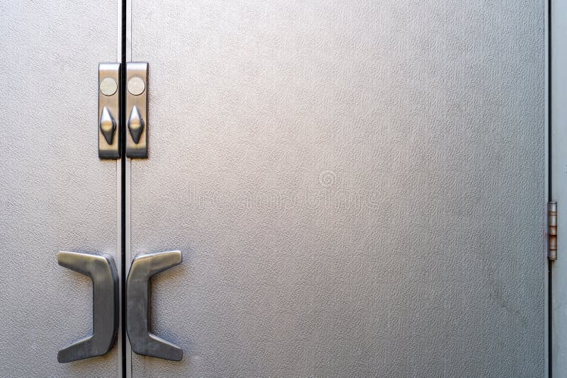 Pair of Metal Doors with Handles and Locks Stock Image - Image of ...