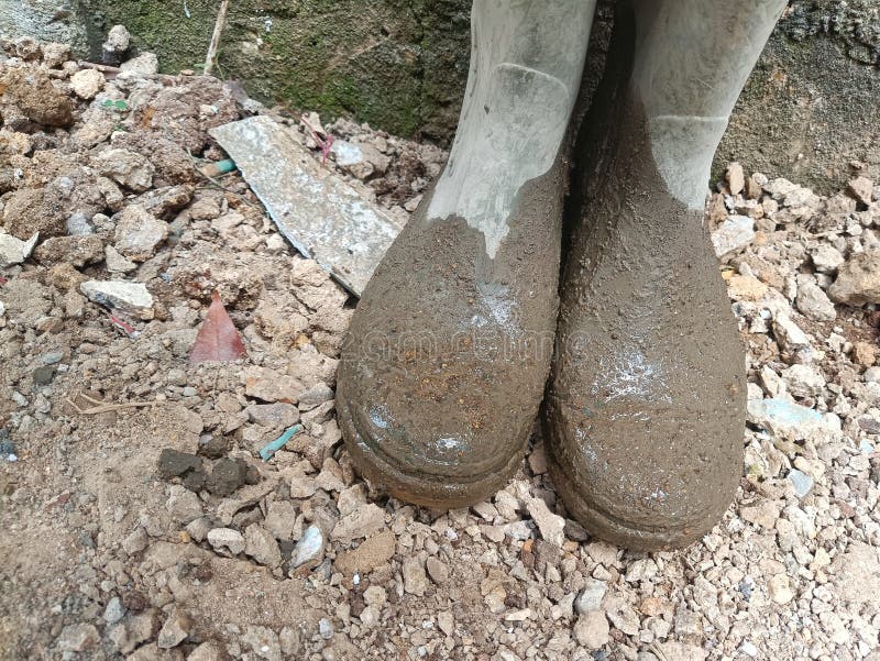 A Pair of Muddy Rubber Boots Stock Image - Image of trail, boot: 327929541