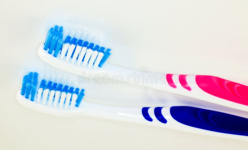 A Pair of Pink and Blue Tooth Brushes, Stock Photo - Image of tooth ...