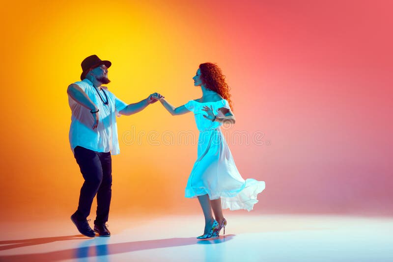 Pair Practices Salsa with Intensity, Refining Their Technique and ...