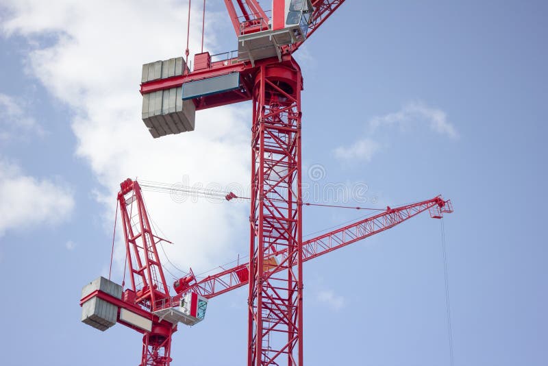 Red Tower Cranes. Construction Industry Concept Stock Photo - Image of ...