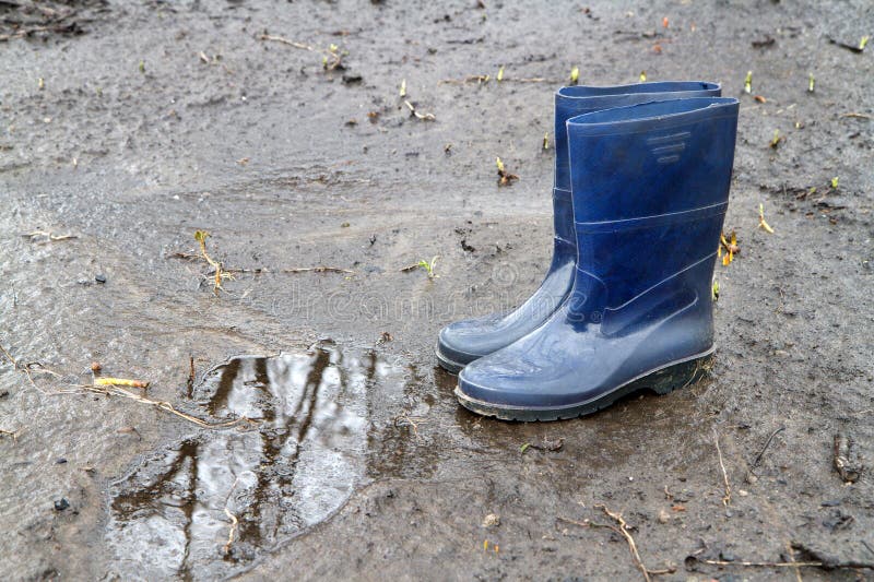 A Pair of Rubber Boots in the Mud. Stock Photo - Image of protection ...