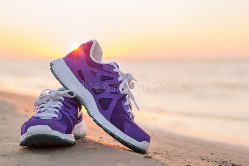 Pair of Running Shoes on the Beach Stock Image - Image of outside ...