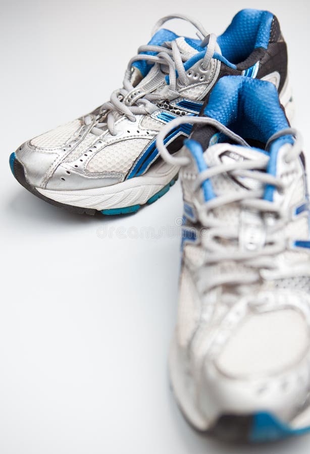Pair of Running Shoes on a White Background Stock Image - Image of ...