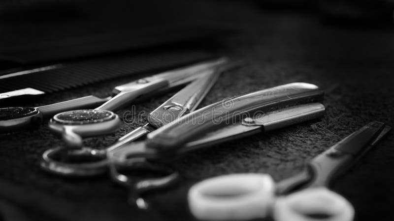 A Pair of Scissors, Razor and Other Tools for Cutting Men S Hair at the ...