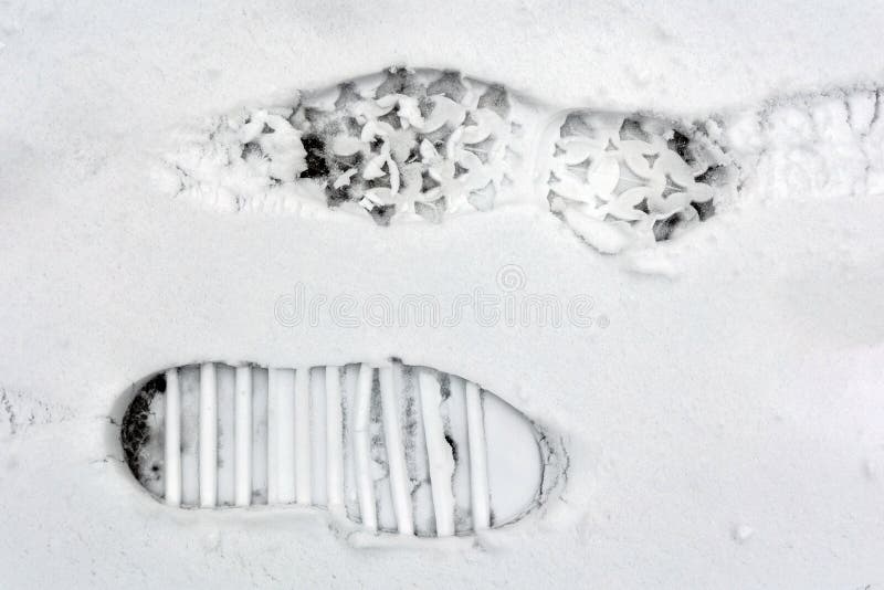 A Pair of Shoe Prints on the Surface of the Snow Stock Photo - Image of ...