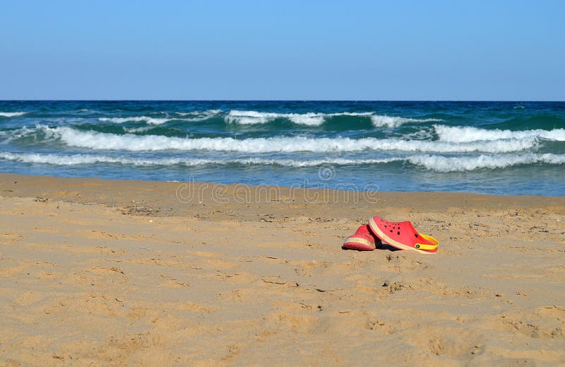 A Pair of Shoes on the Beach Stock Photo - Image of spain, beach: 46125192