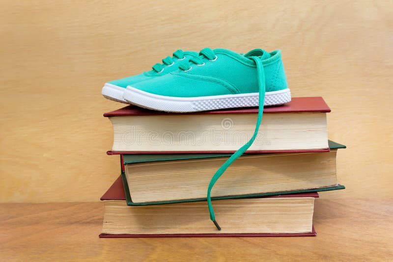 A Pair of Shoes on a Stack of Books Stock Image - Image of autumn ...
