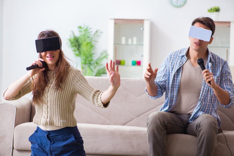 The Pair Singing Karaoke With Virtual Reality Glasses Stock Image Image Of Music Glasses