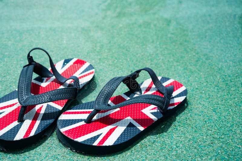 A Pair of Slippers in Pool Side Stock Photo - Image of holidays ...