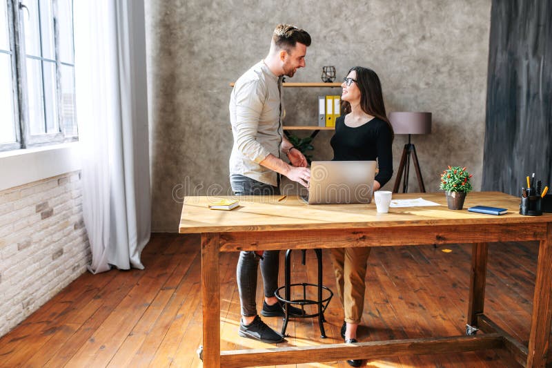 Pair of Friendly Colleagues Work in Office Stock Image - Image of desk ...
