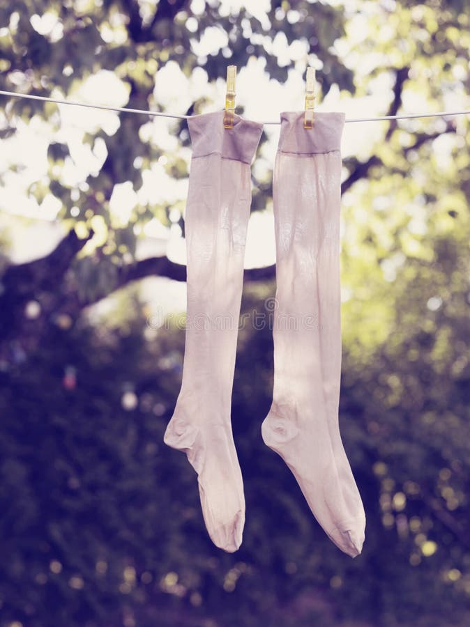 Pair of Socks Drying on Clothesline Stock Illustration - Illustration ...