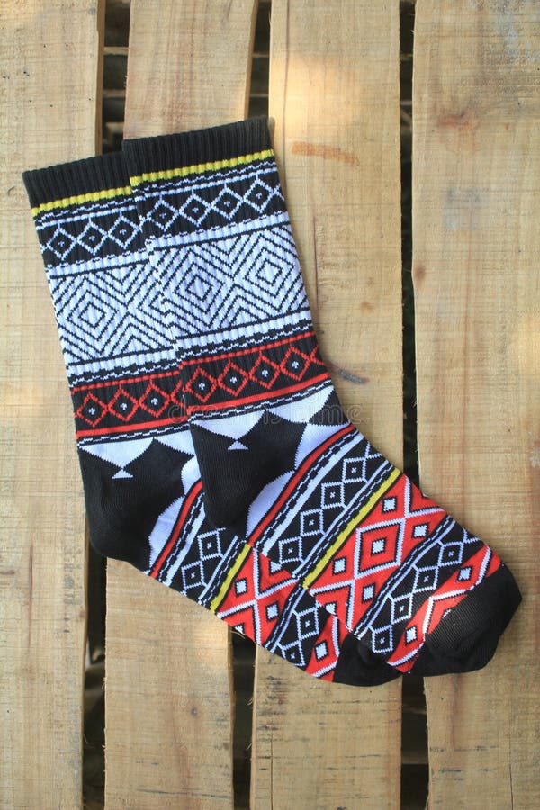 Pair of Socks with Various Patterns Lying on a Wooden Base Stock Image ...