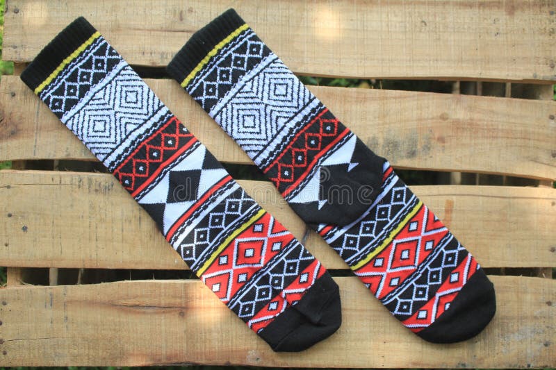 Pair of Socks with Various Patterns Lying on a Wooden Base Stock Image ...