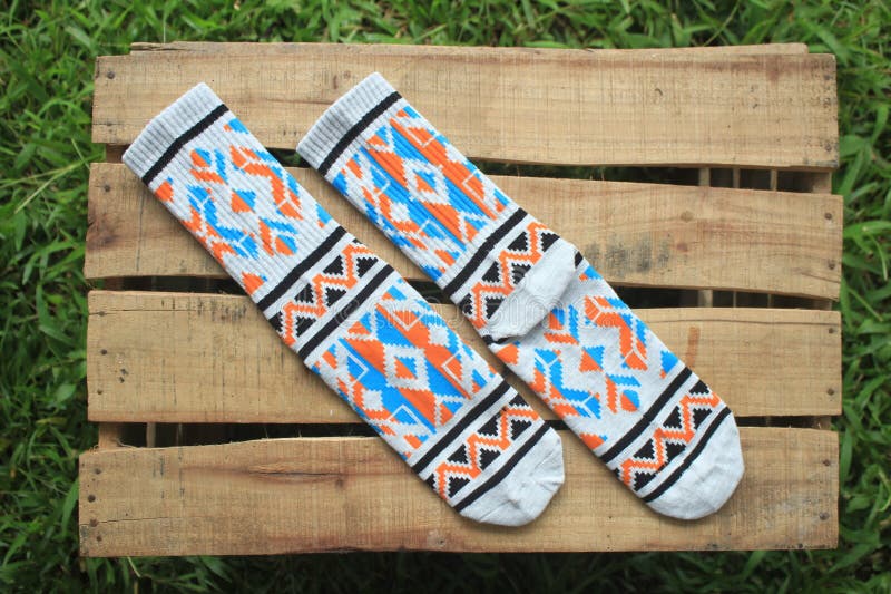 Pair of Socks with Various Patterns Lying on a Wooden Base Stock Image ...