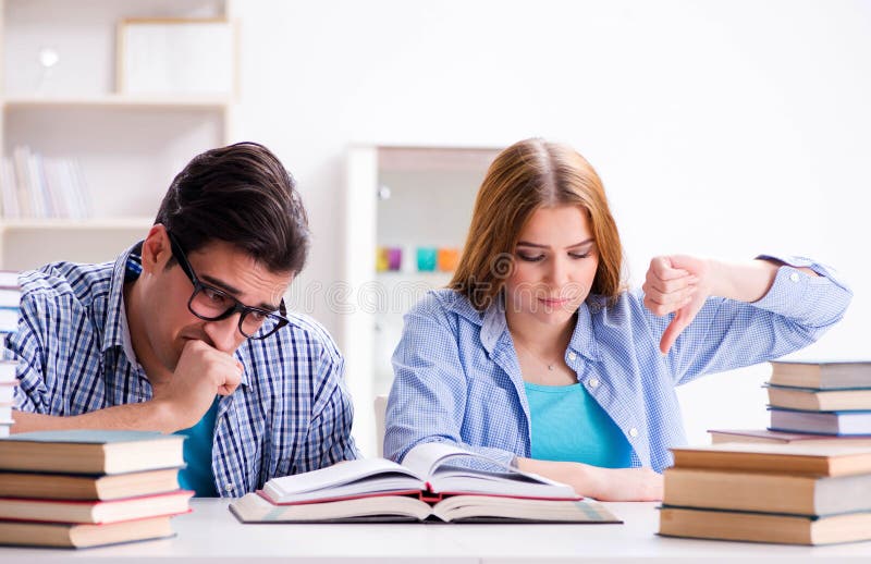 Pair of Students Studying for University Exams Stock Image - Image of ...