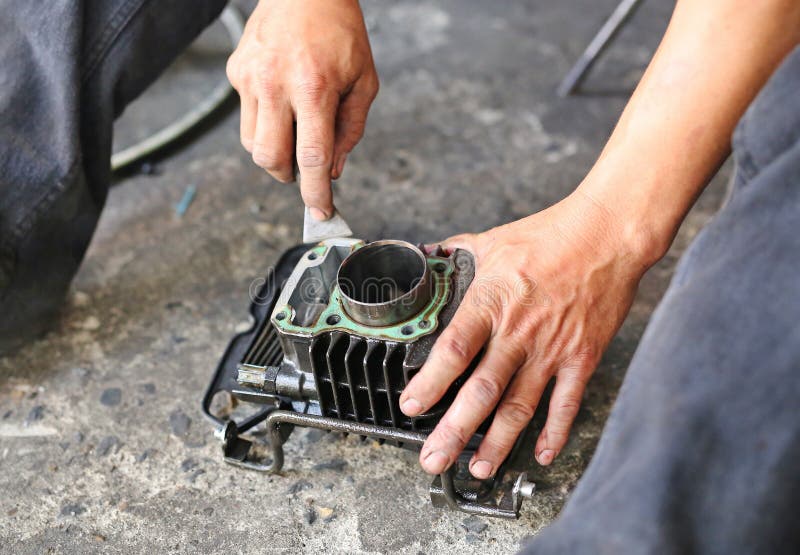 A Pair of Technician Hand Fixing the Motorcycle Stock Photo - Image of ...