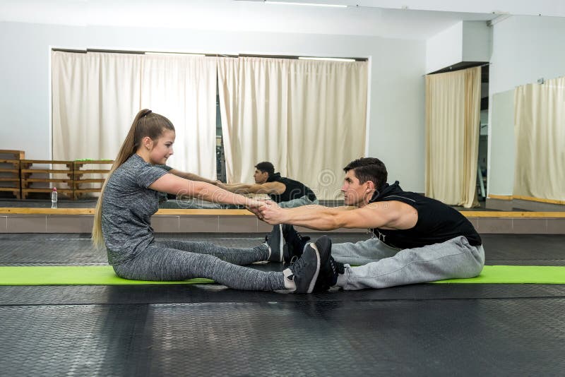 Pair Training in Gym, Man and Woman Doing Exercise Stock Photo - Image ...