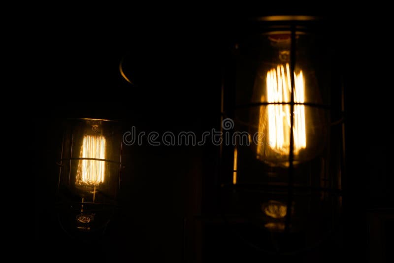 Pair of Vintage Electrical Lamps Lighting Up in Dark Room Stock Image ...
