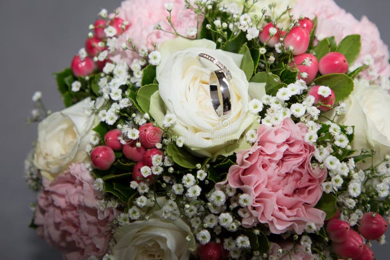 Pair of Wedding Rings Flowers Bridal Bouquet Stock Photo - Image of ...