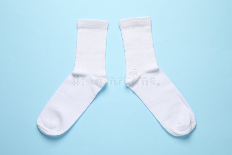 Pair of White Socks on Light Blue Background, Flat Lay Stock Image ...