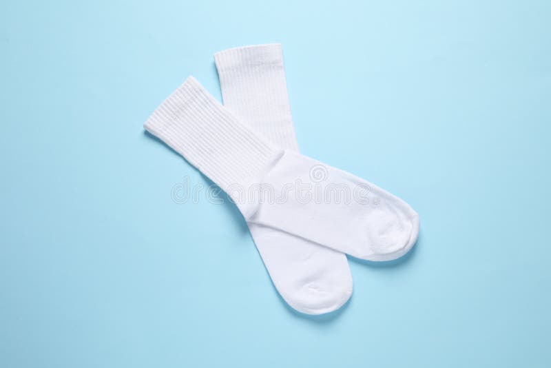 Pair of White Socks on Light Blue Background, Flat Lay Stock Image ...