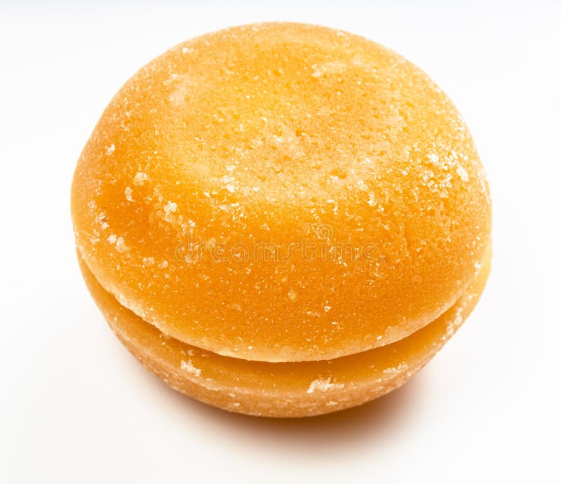 Pair of Whole Round Pieces of Palm Sugar on Gray Stock Photo - Image of ...