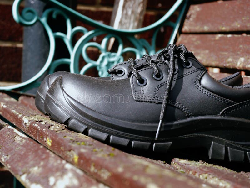 Pair of Work Boots on Garden Bench Stock Image - Image of dirt, chores ...
