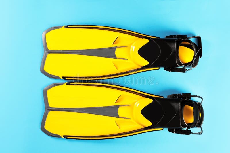 Pair of Yellow Flippers on Sand, Top View. Space for Text Stock Photo ...