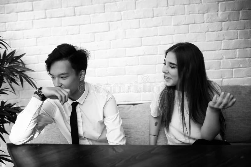 A Pair of Young People Talking Stock Image - Image of married ...