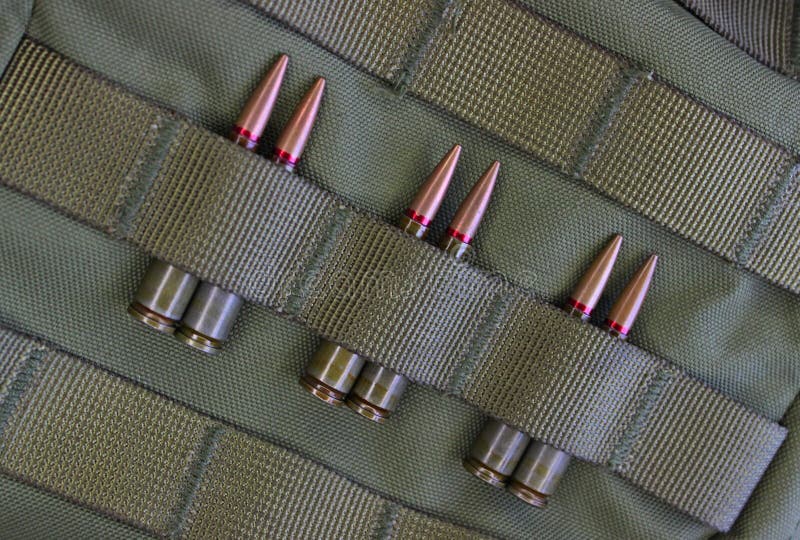 Assault Rifle Bullets are Pairwise Stuffed Under Belts of Tactical ...