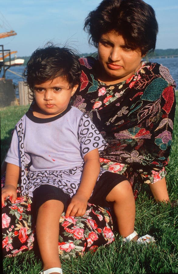 A Pakistani Mother and Child at a Harbor, Alexandria, VA Editorial ...